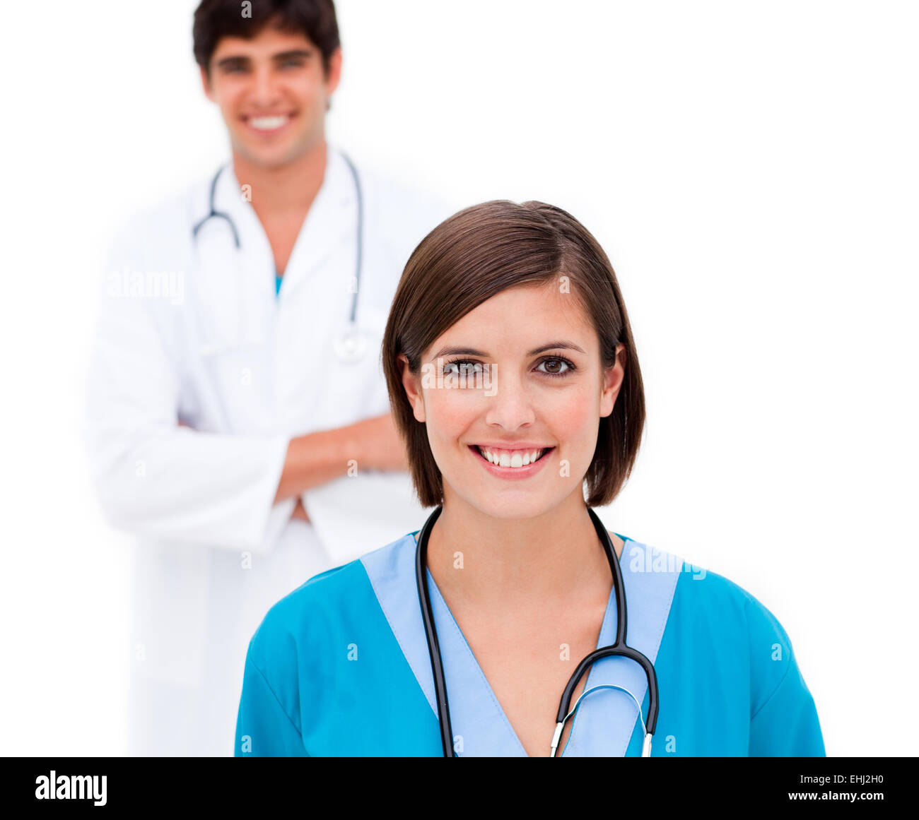 Female doctor smiling at the camera Stock Photo - Alamy