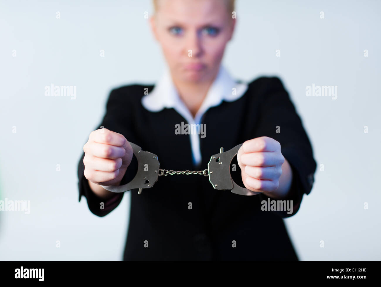 Couple handcuffs suit hi-res stock photography and images - Alamy