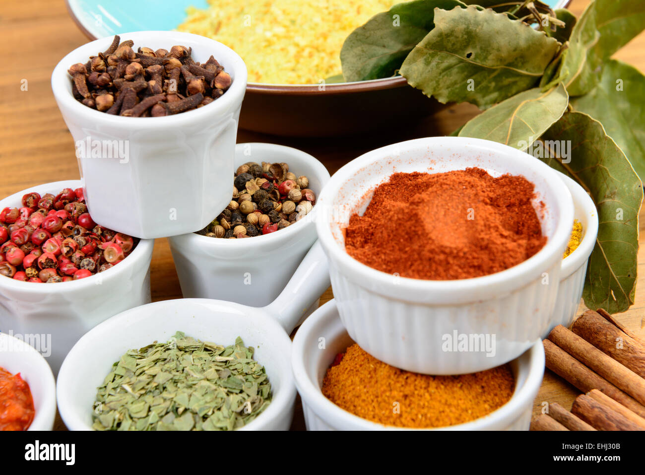 several Indian spices on the old wooden table Stock Photo - Alamy