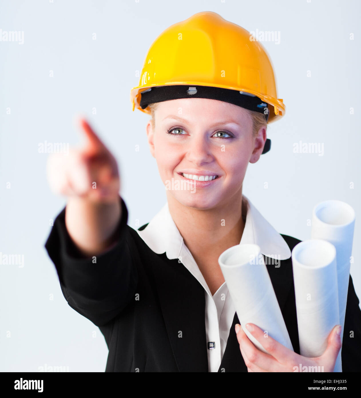 Female Construction worker pointing Stock Photo - Alamy