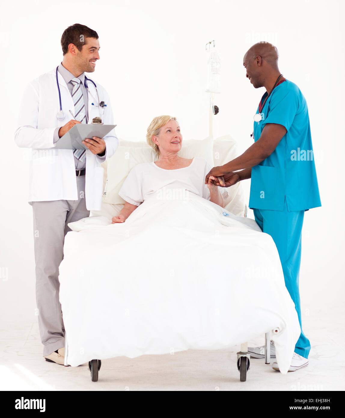 Surgeon greeting his patient Stock Photo - Alamy