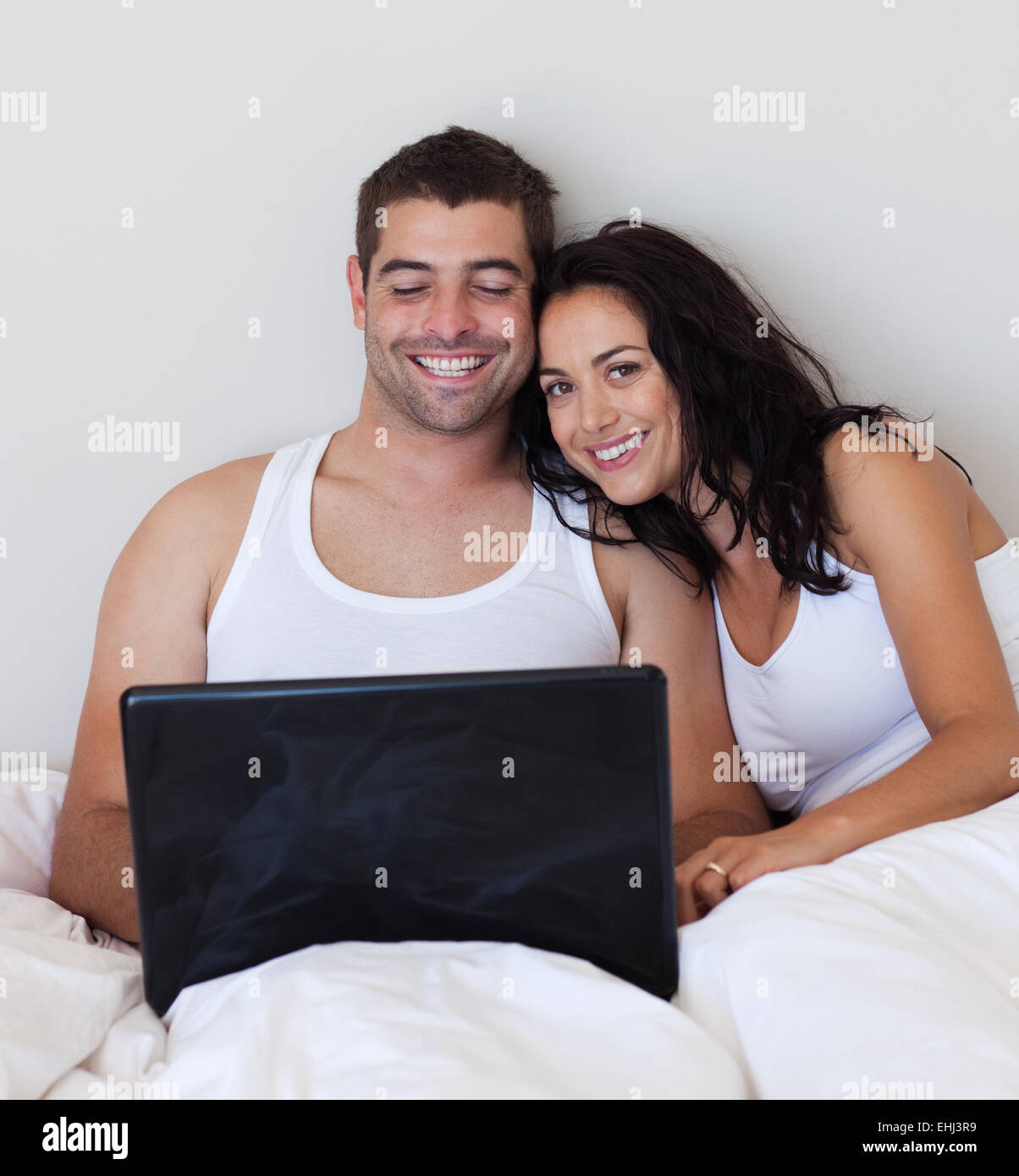 Couple surfing on internet Stock Photo - Alamy