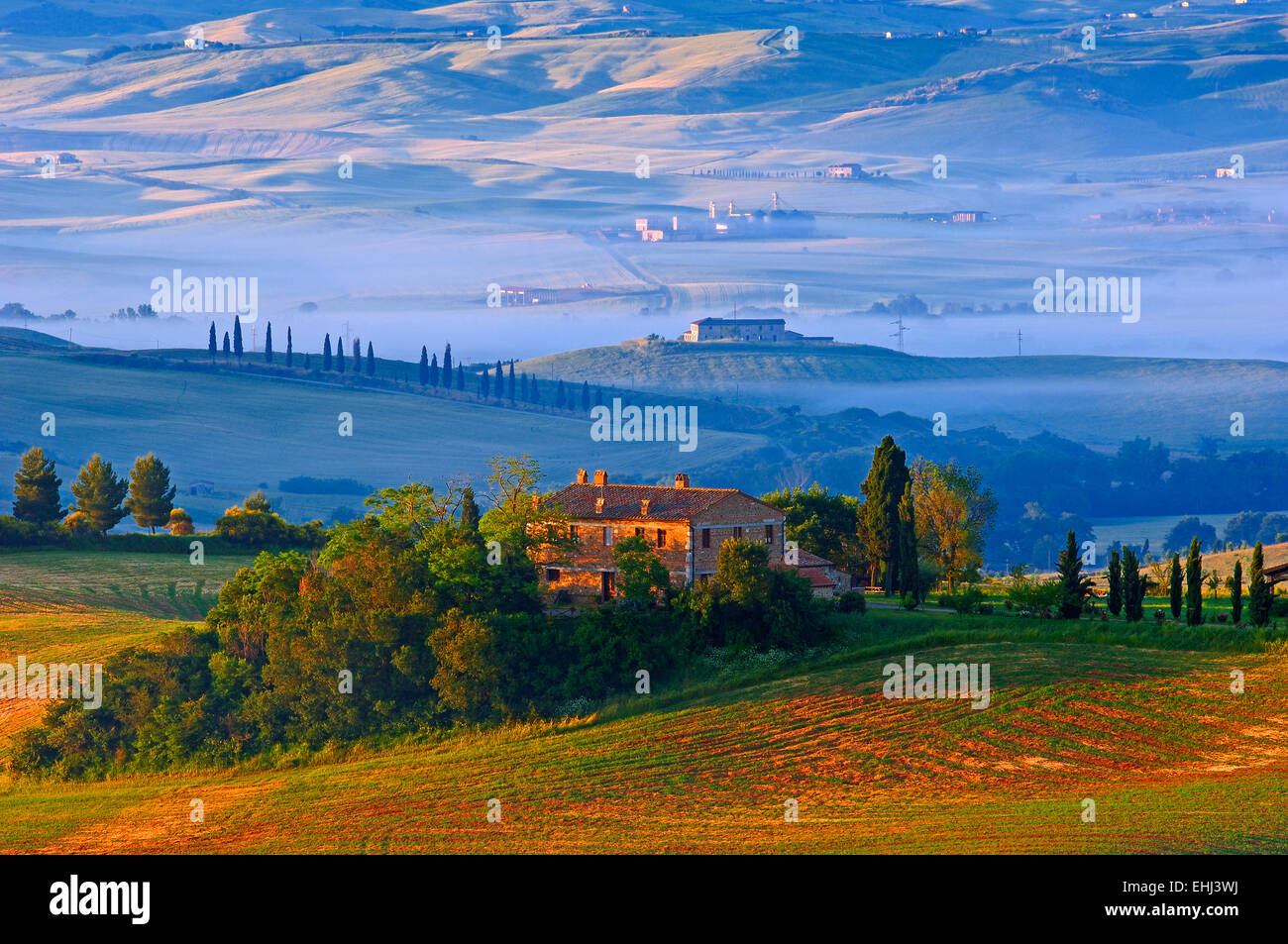 Val d'Orcia. Orcia Valley at dawn. Morning fog. UNESCO World Heritage ...
