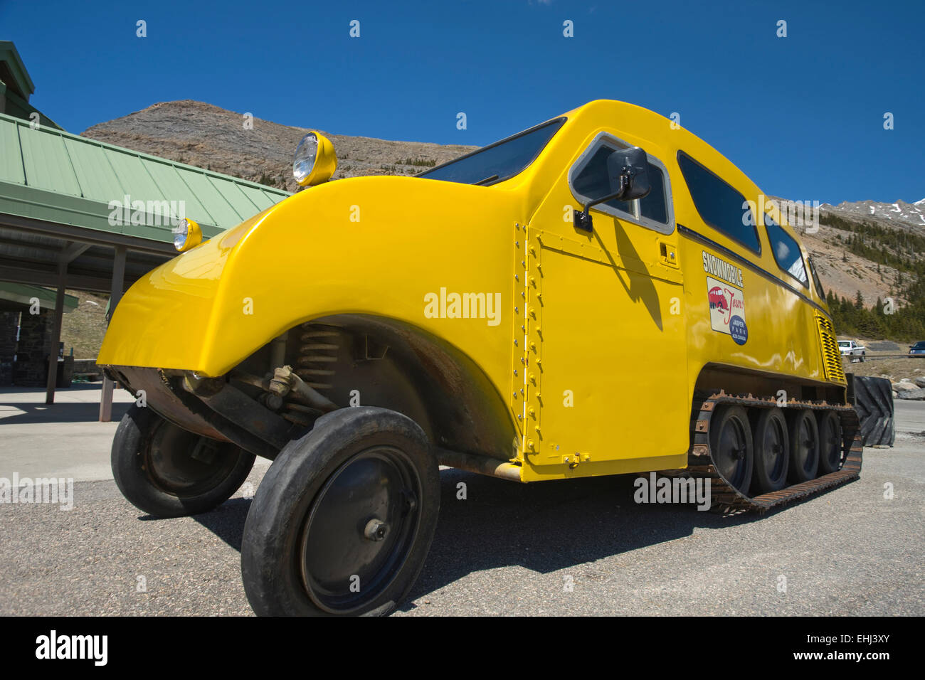 OLD YELLOW TOUR SNOWMOBILE AT VISITORS CENTER COLUMBIA ICEFIELD JASPER ...