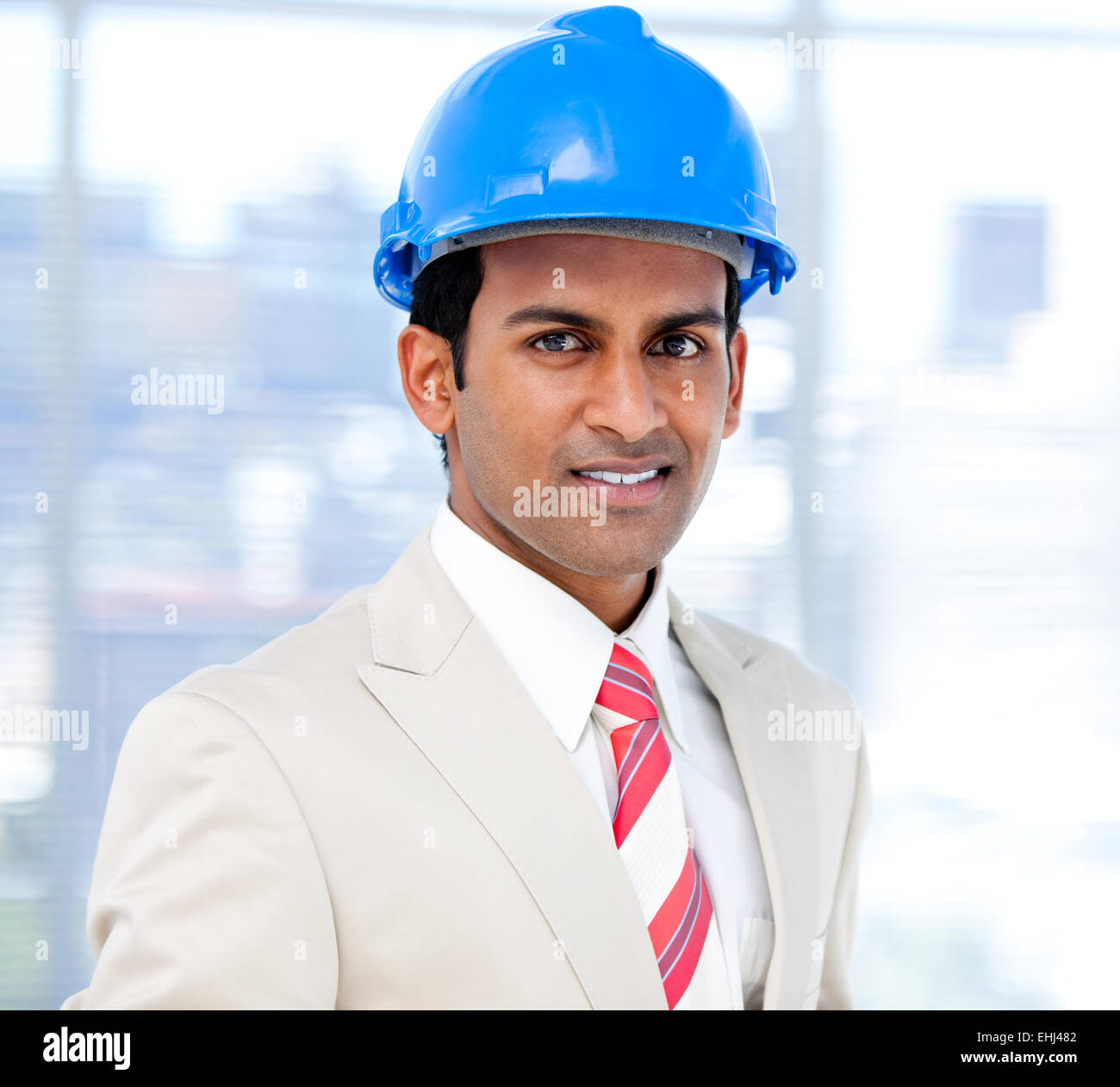 Delighted ethnic male standing hi-res stock photography and images - Alamy