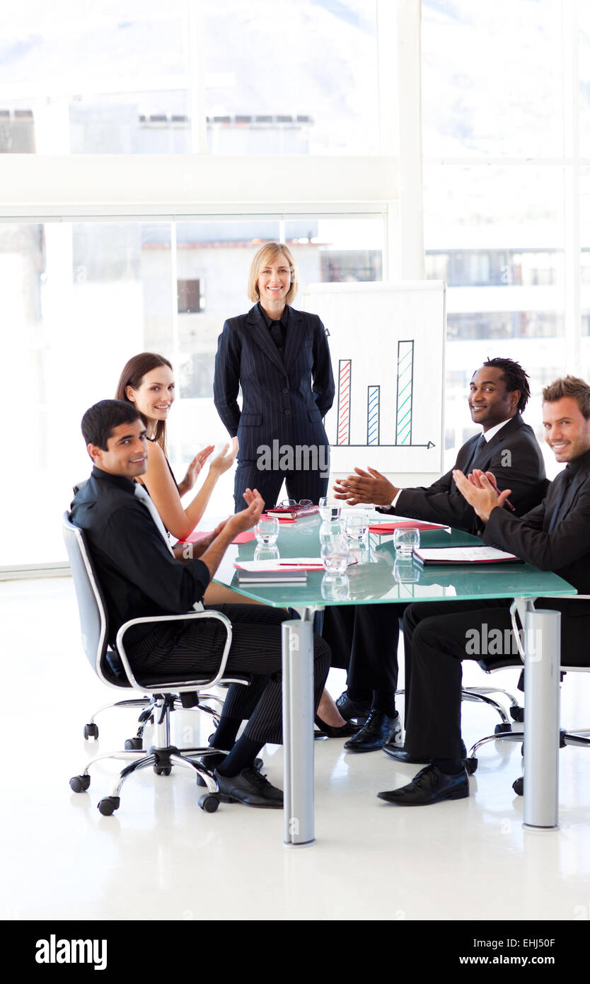 Businesspeople clapping in a presentation Stock Photo - Alamy