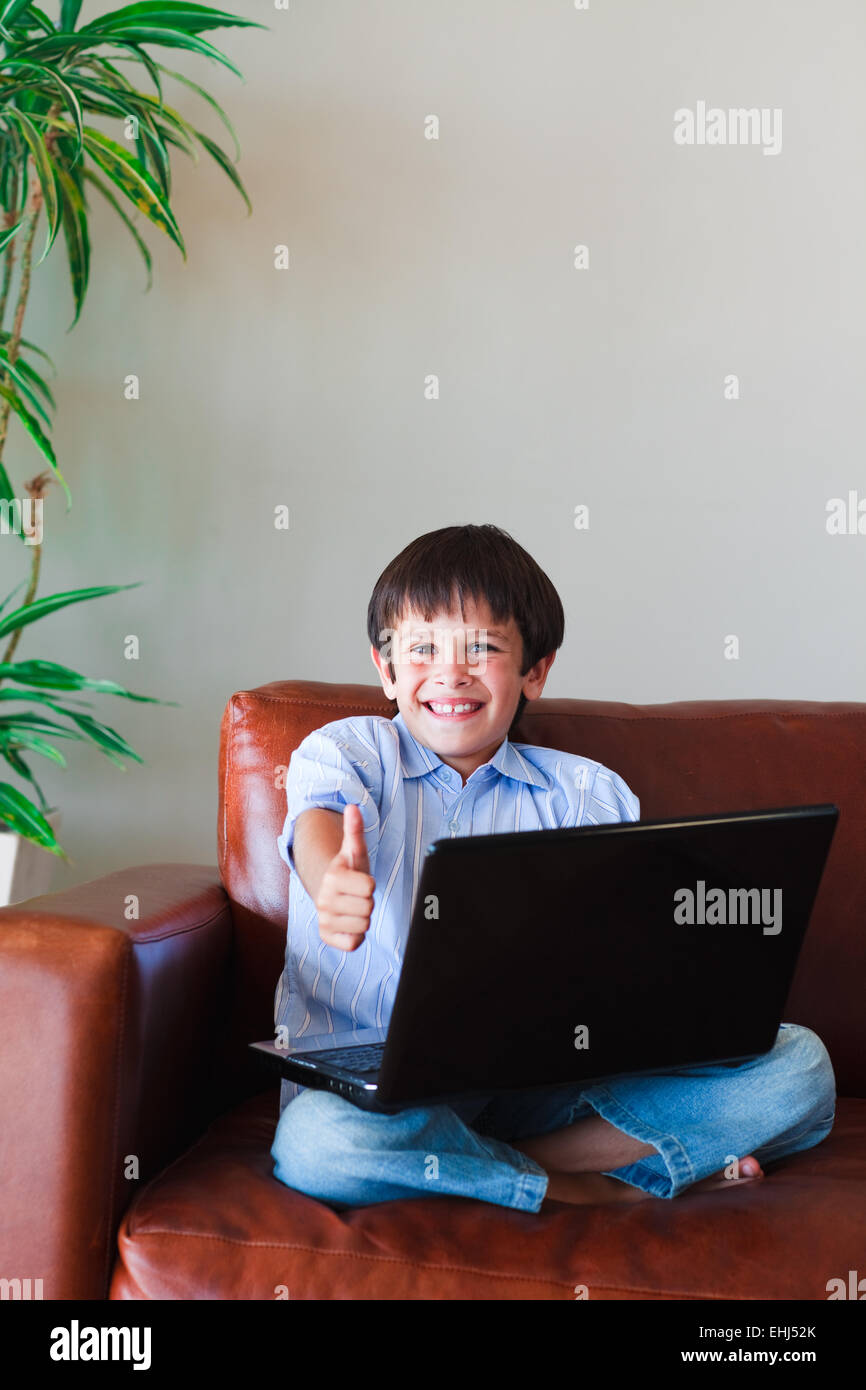 Child playing with his laptop Stock Photo - Alamy