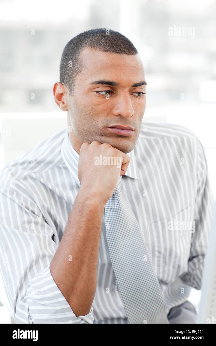 Bored businessman at his desk Stock Photo - Alamy