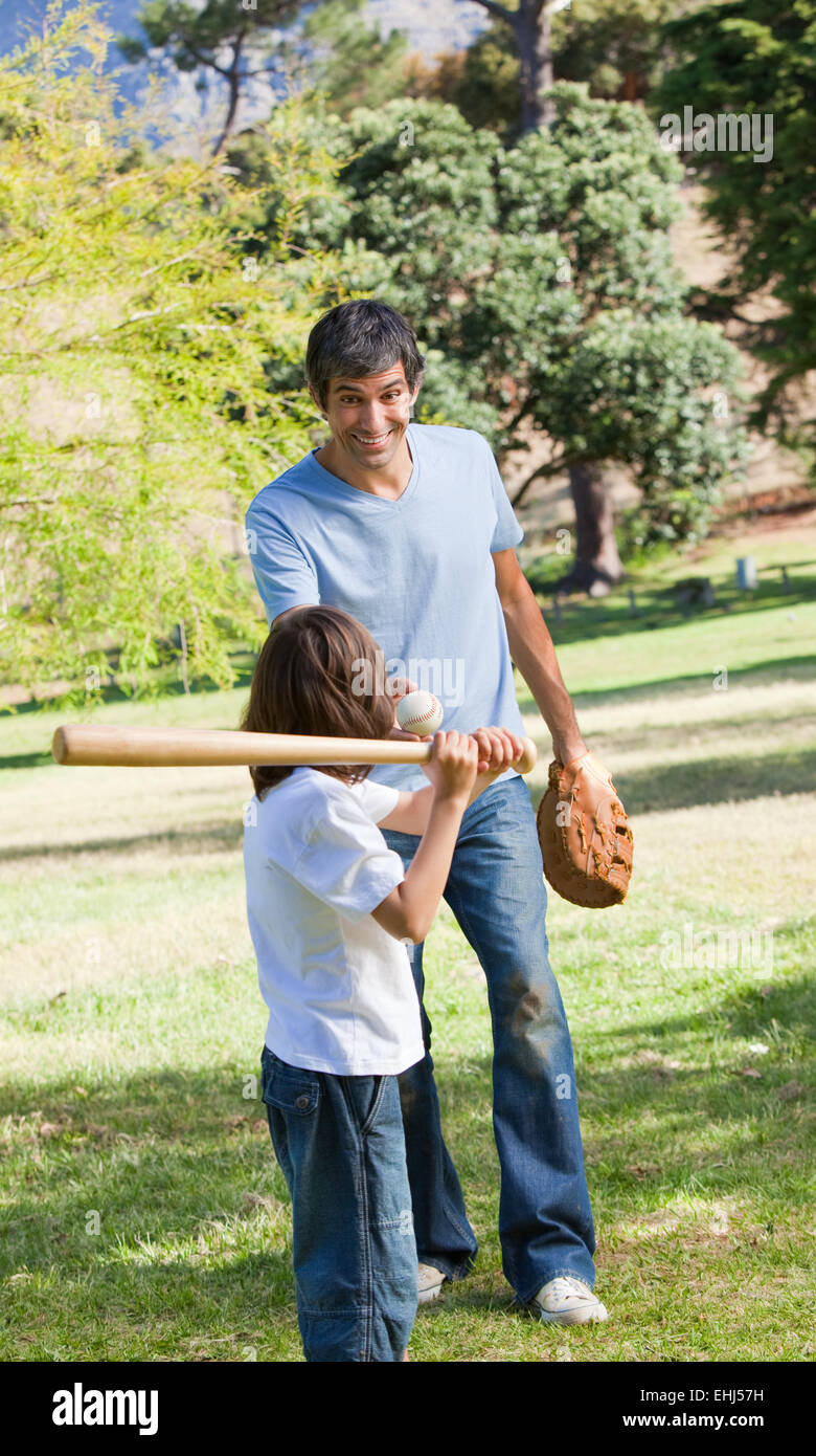 Happy father and his son playing baseball Stock Photo - Alamy