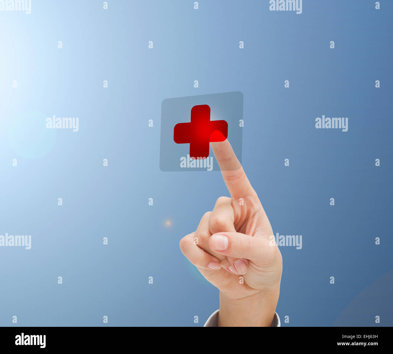 Womans hand pointing to hospital symbol Stock Photo - Alamy