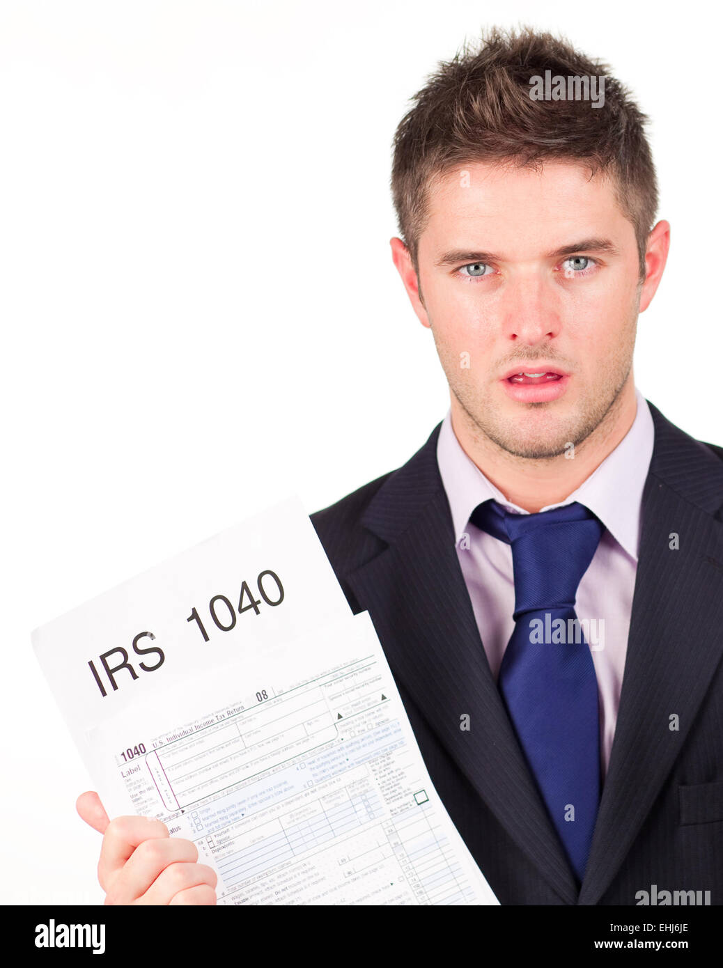 Man holding out his irs returns form Stock Photo - Alamy