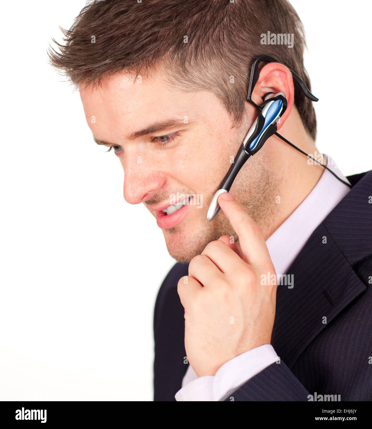 Businessman talking on a headset Stock Photo - Alamy