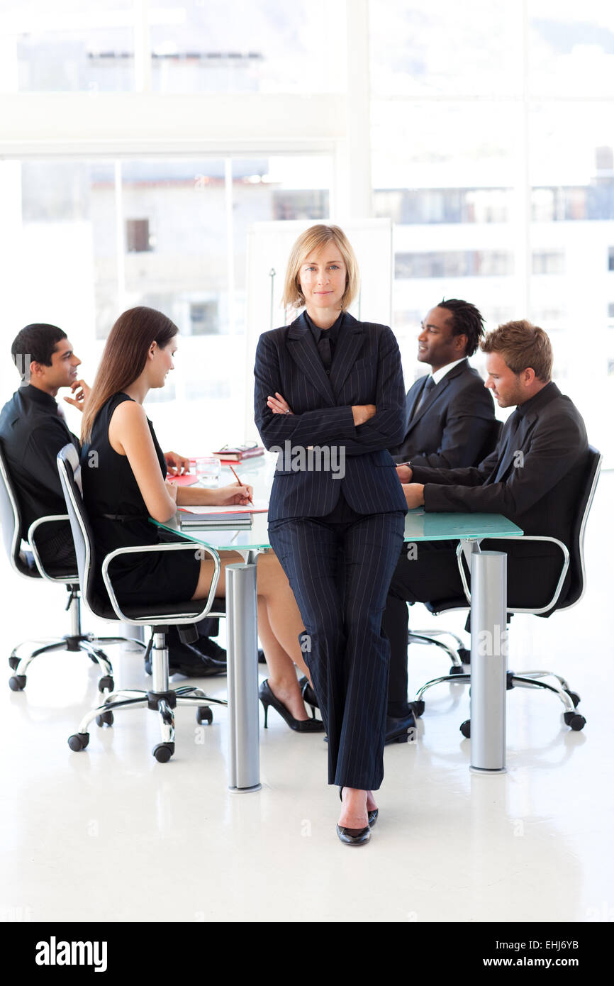 Serious female manager looking at the camera Stock Photo - Alamy