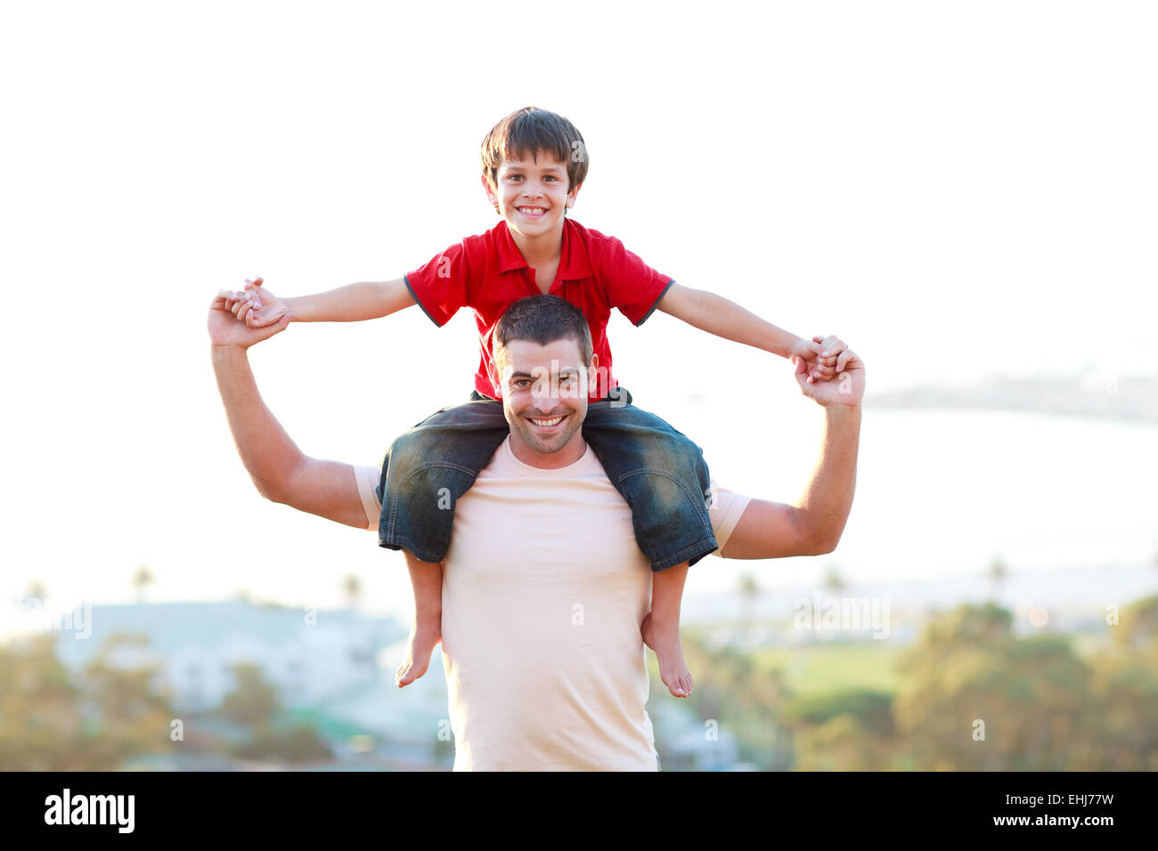 Father giving son piggyback ride hi-res stock photography and images ...