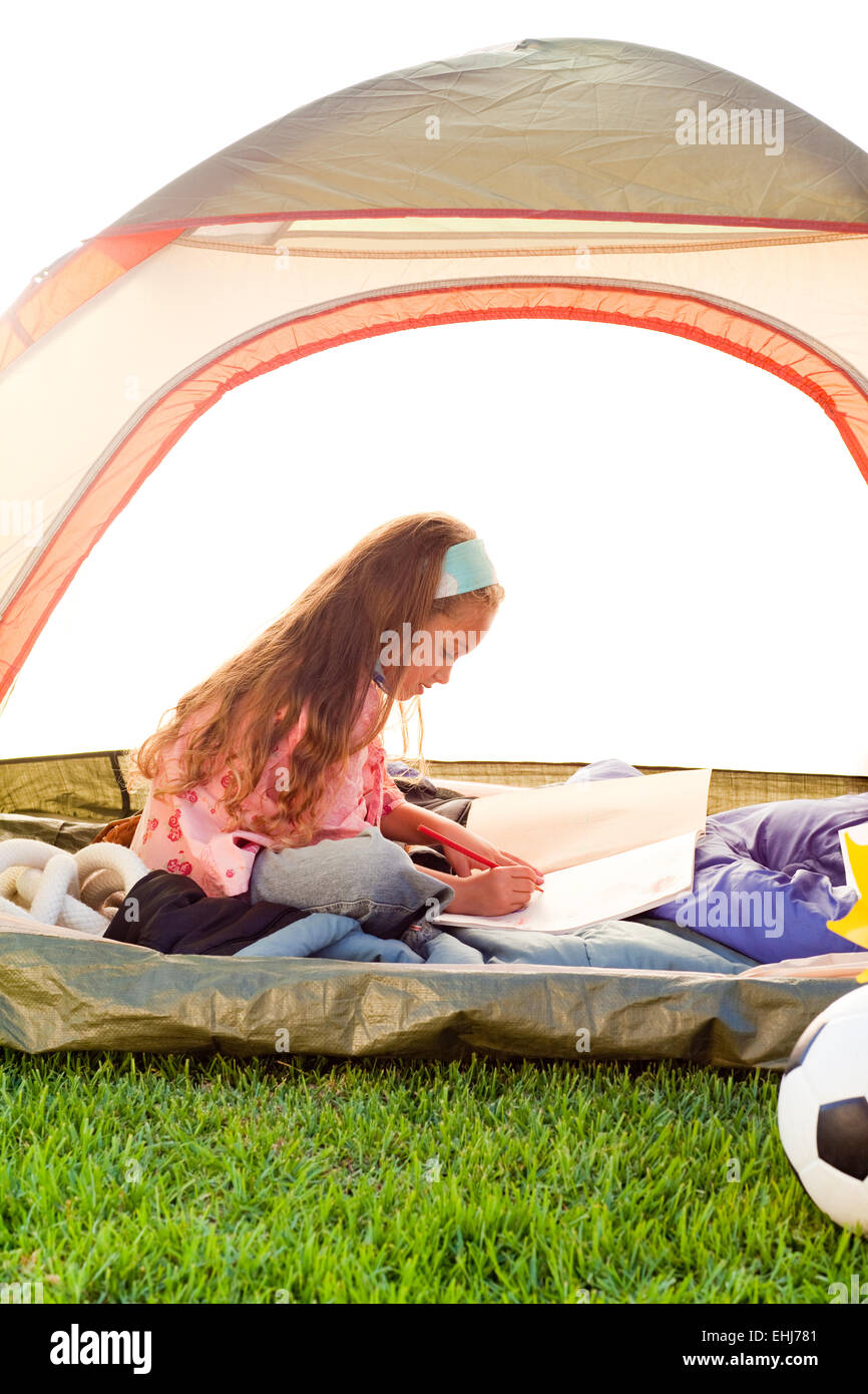 Young girl in tent Stock Photo - Alamy