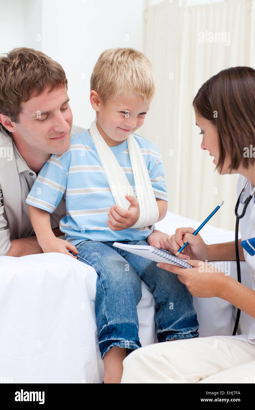 Smiling little boy at a medical visit Stock Photo - Alamy