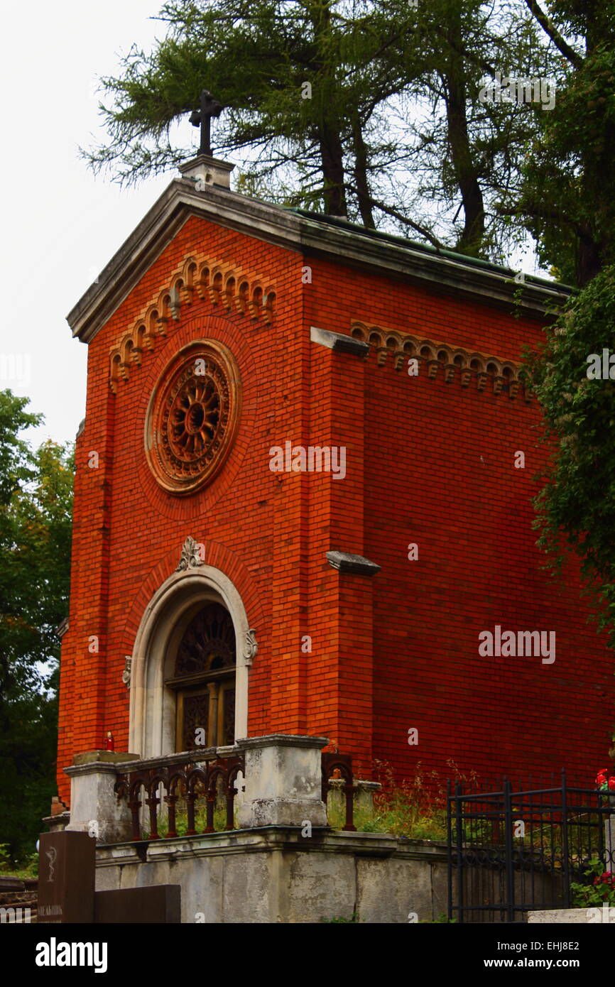 standing brick family vault red with lampads Stock Photo - Alamy