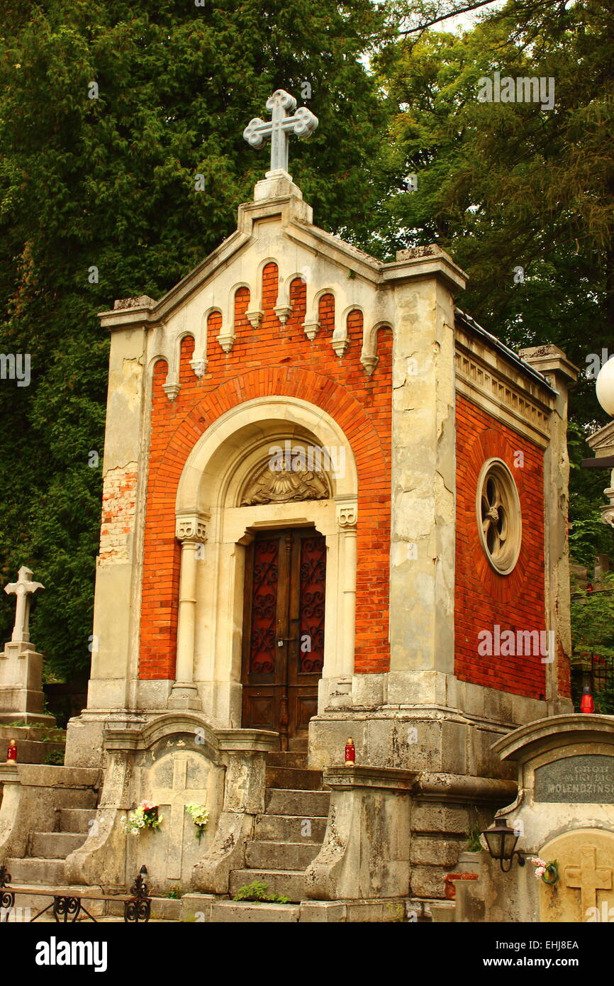 standing brick family vault red with lampads Stock Photo - Alamy