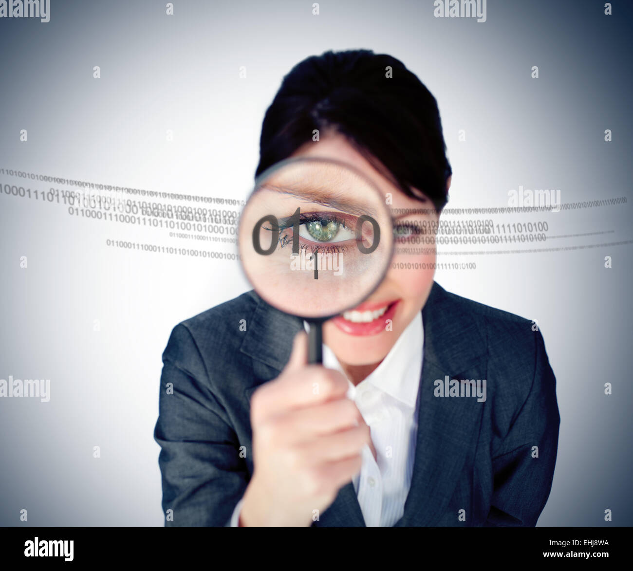 Businesswoman looking through magnifying glass Stock Photo - Alamy