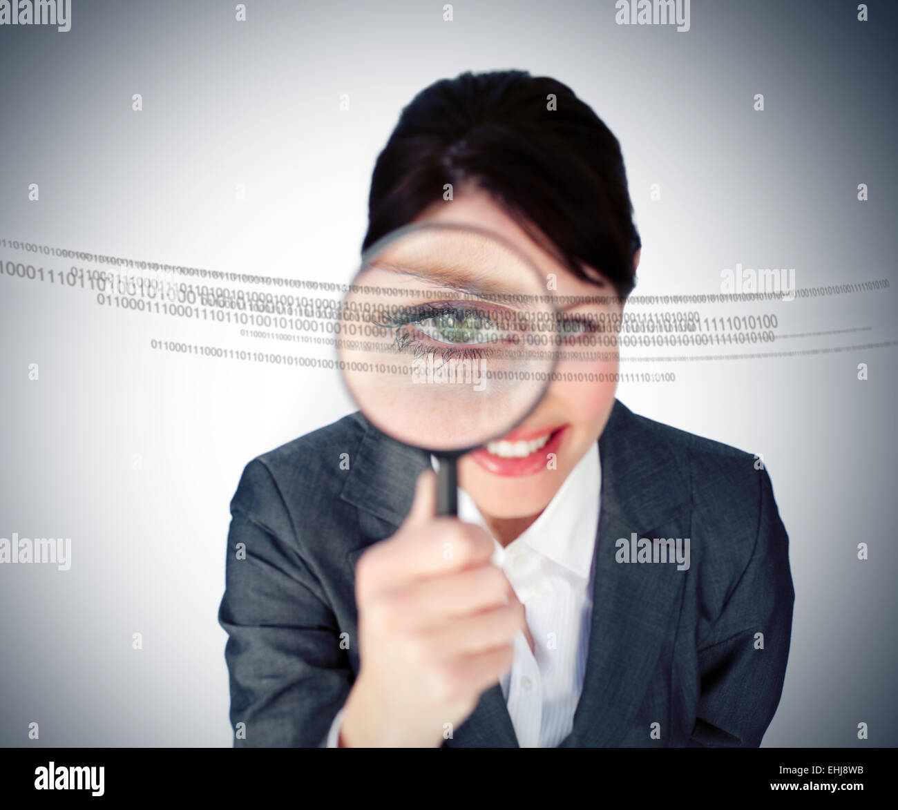 Woman holding magnifying glass Stock Photo - Alamy