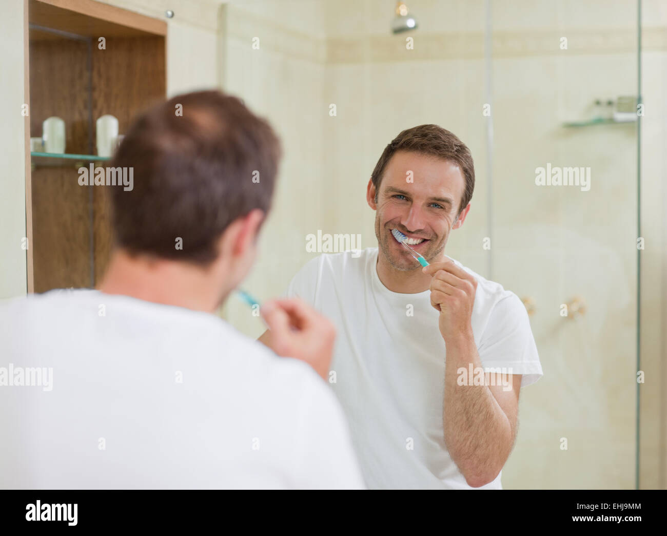Man brushing his teeth Stock Photo - Alamy