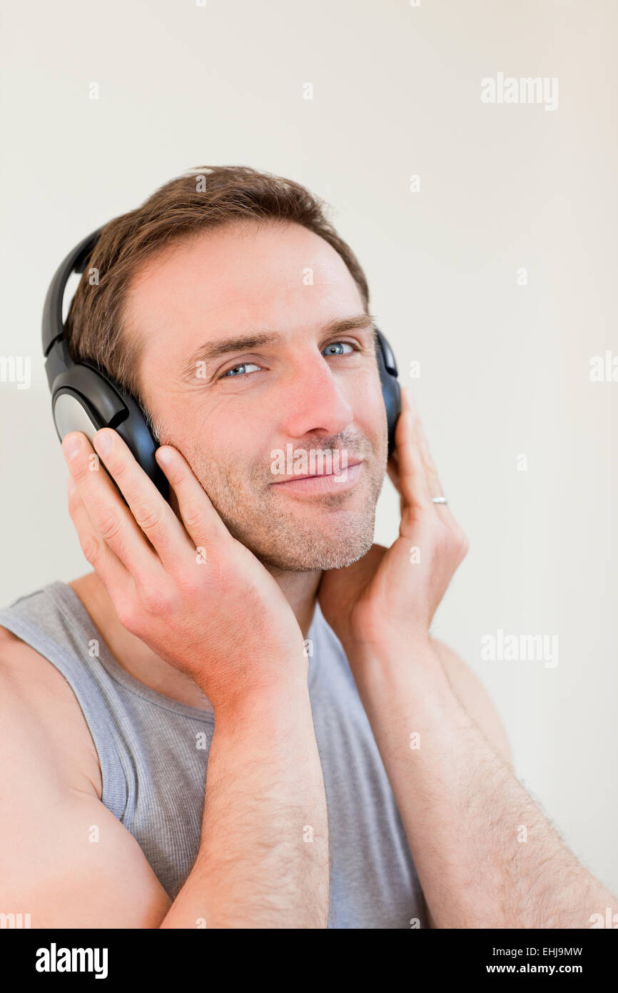Handsome man listening to some music Stock Photo - Alamy