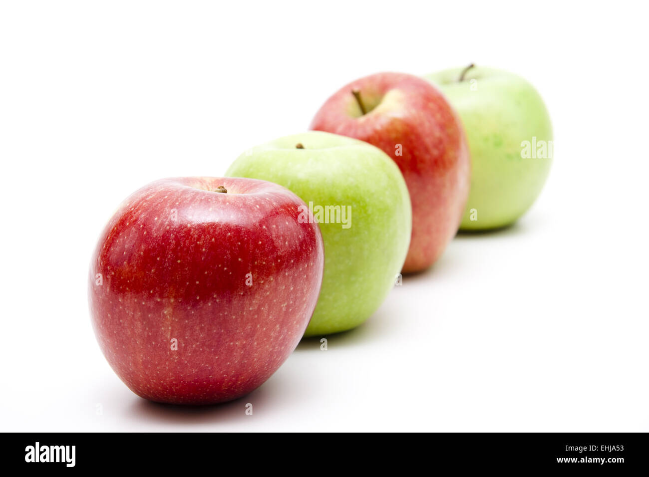 Apples in row Stock Photo - Alamy