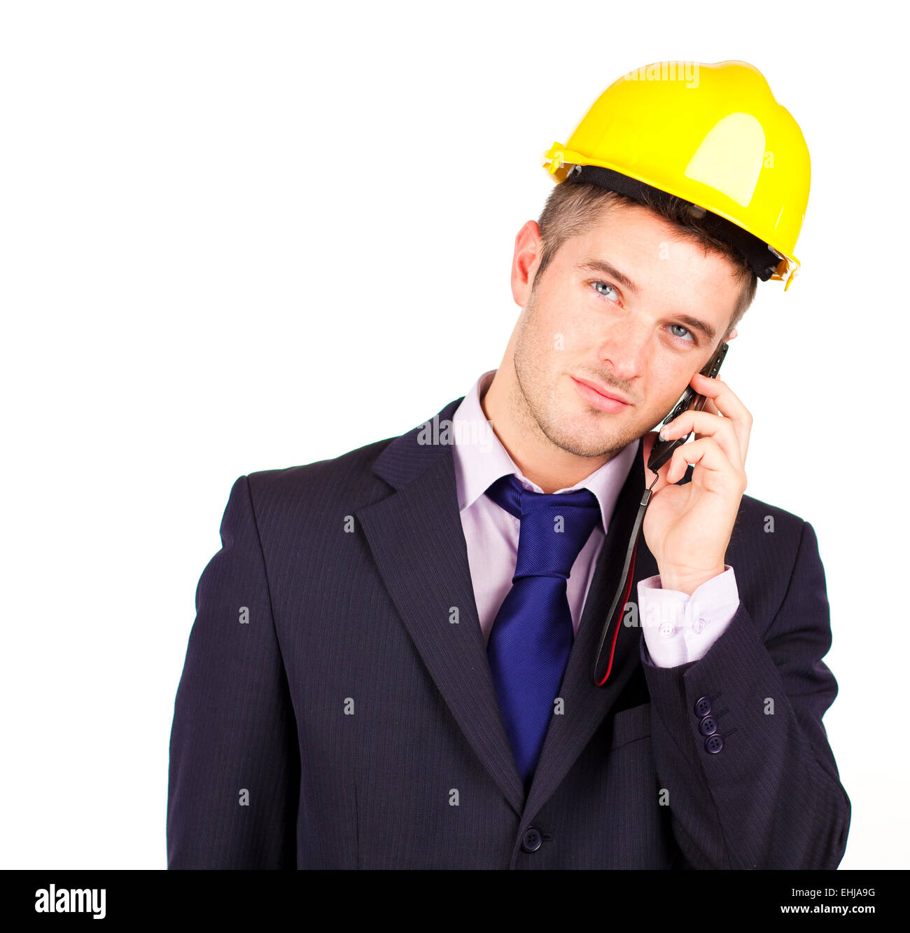 Construction worker talking on the phone Stock Photo - Alamy