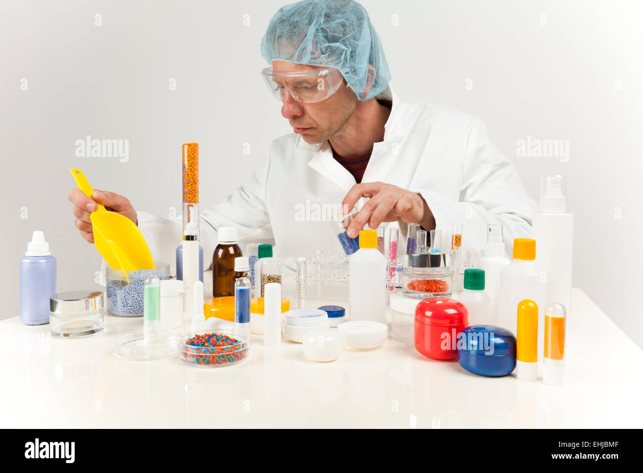 technician working with plastic granules Stock Photo - Alamy
