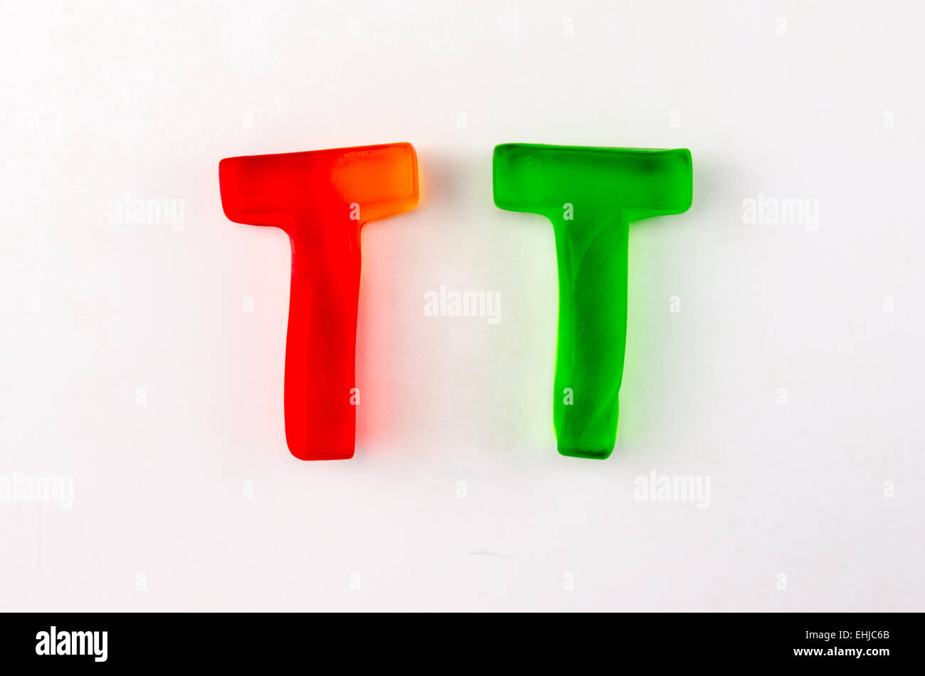 A set of two gummy letters in the shape of T isolated on white Stock ...