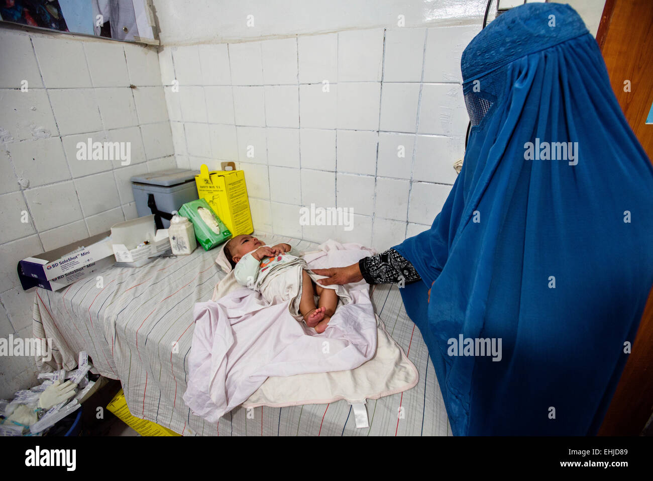 Mother wearing traditional Muslim burka and her child in Central ...