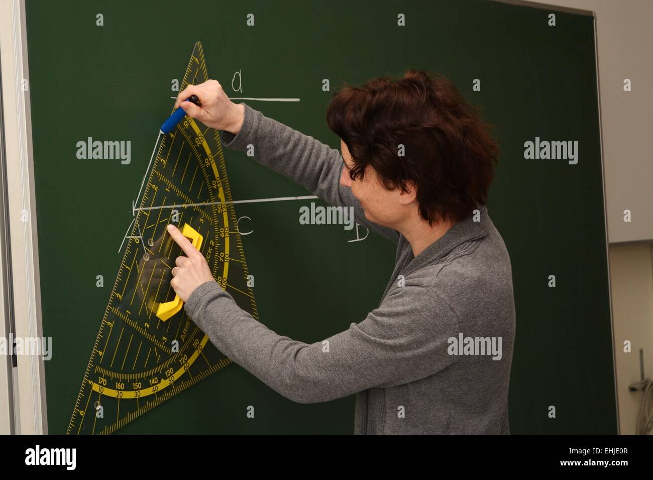 teacher with blackboard Stock Photo - Alamy