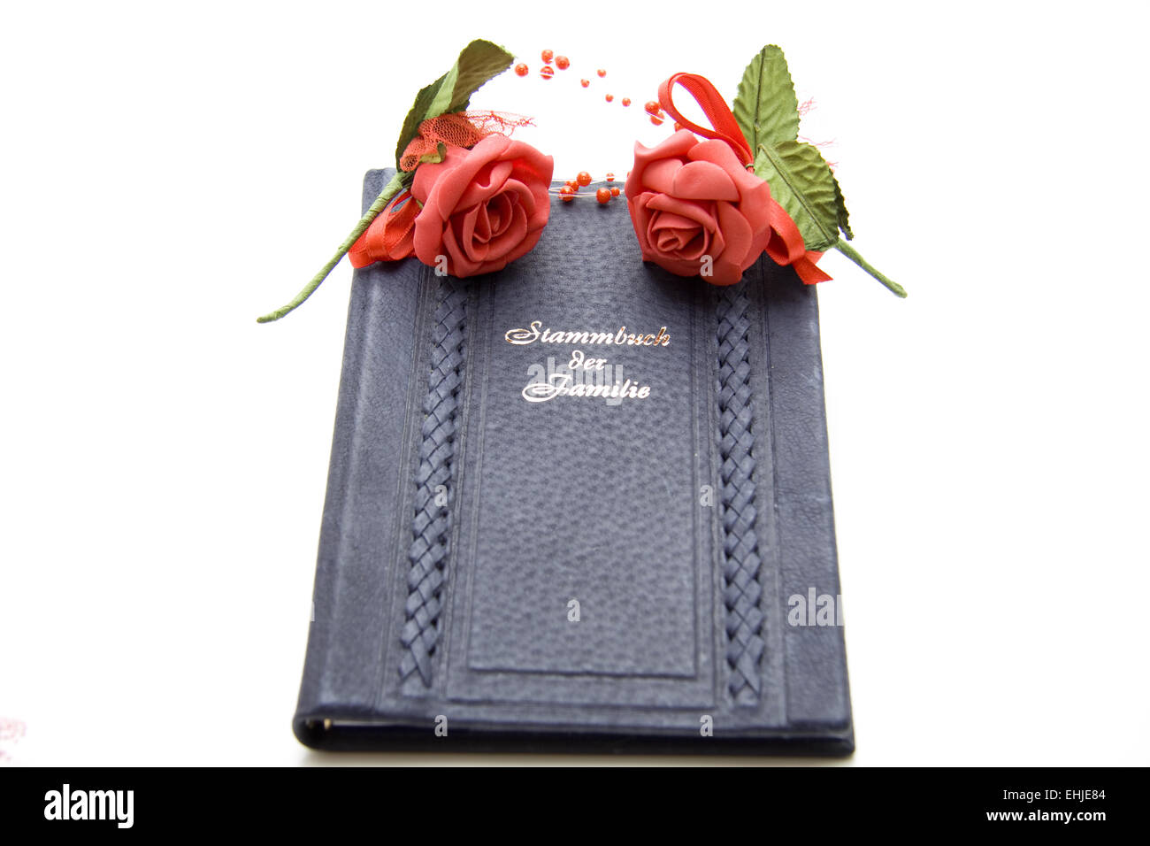 Red roses on register Stock Photo - Alamy