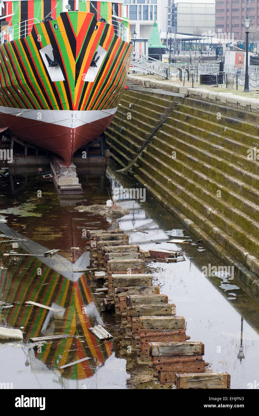 The multi-colored Dazzle ship in dry docks Liverpool Stock Photo - Alamy
