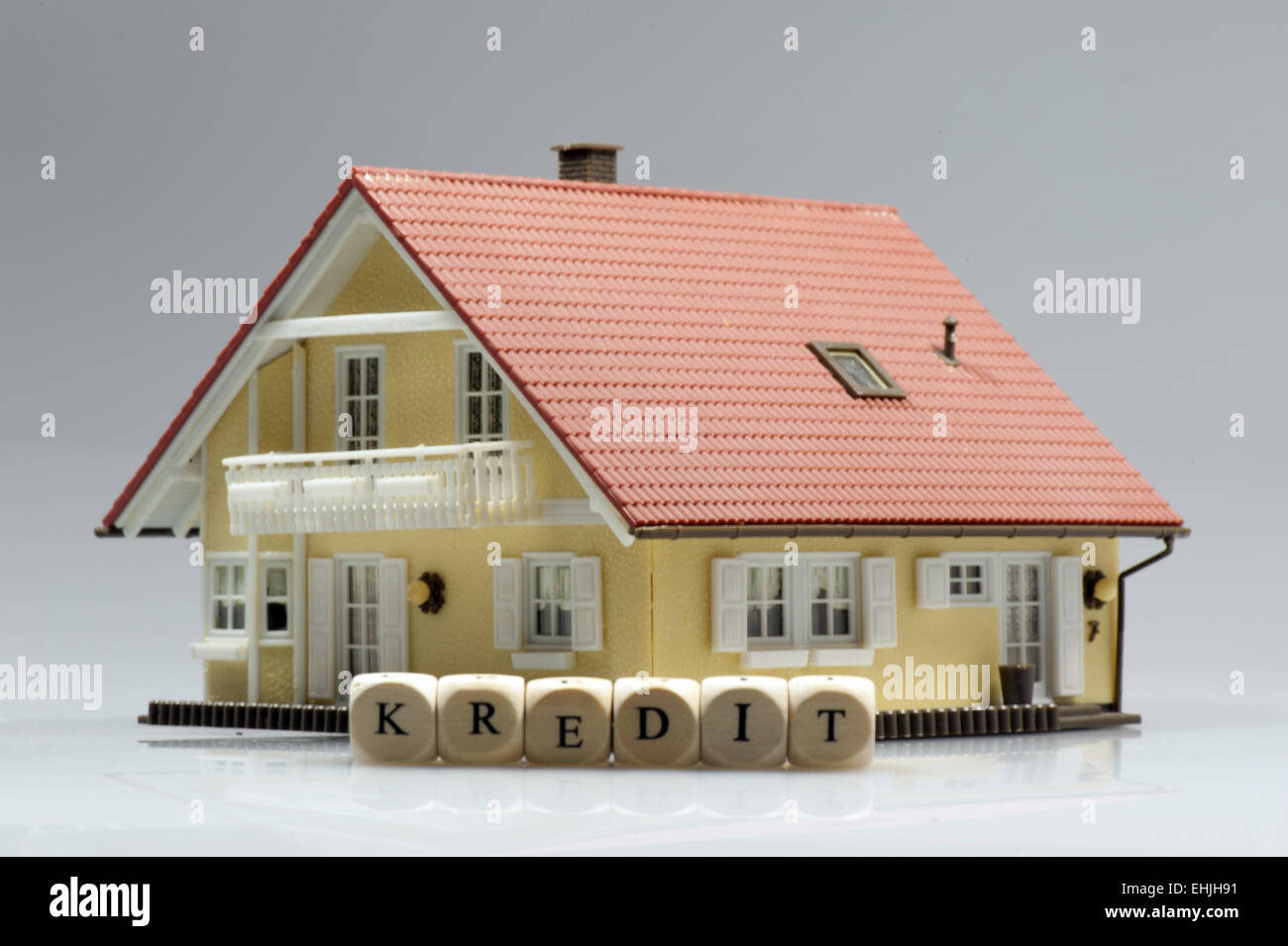 Model house with word credit Stock Photo - Alamy