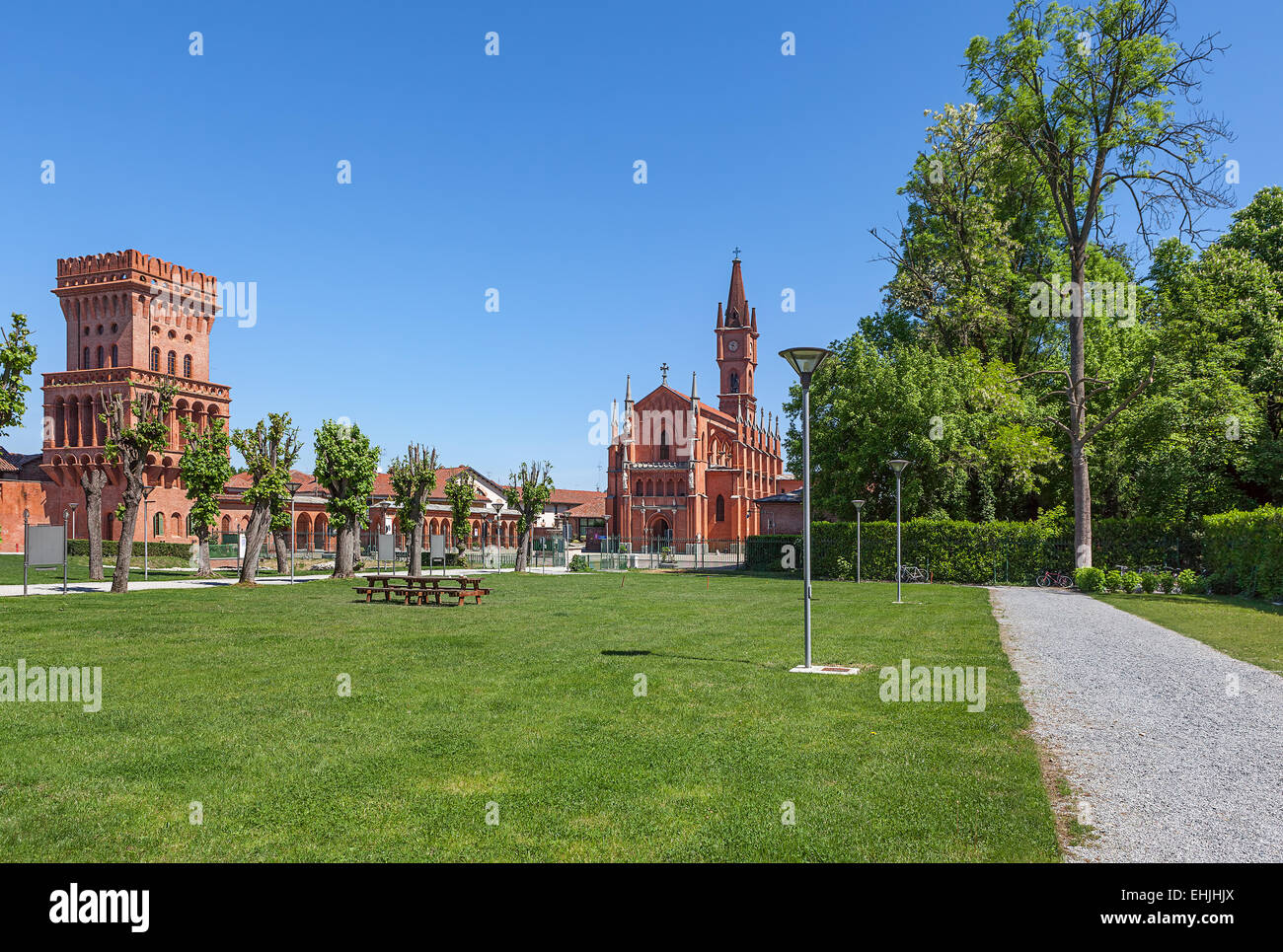 Small park in front of catholic church and tower of University of ...
