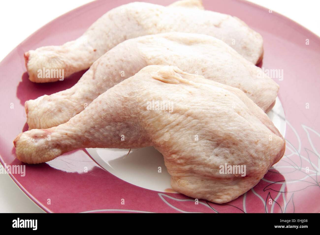 Chickens thigh raw Stock Photo - Alamy