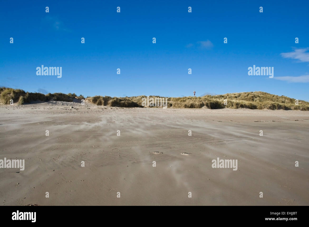 sand blowing along the beach at Seahouses, Northumberland Stock Photo ...