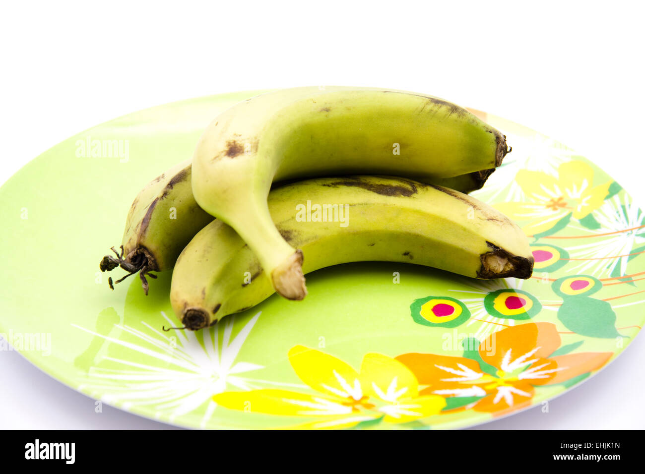 Bananas on plate Stock Photo - Alamy