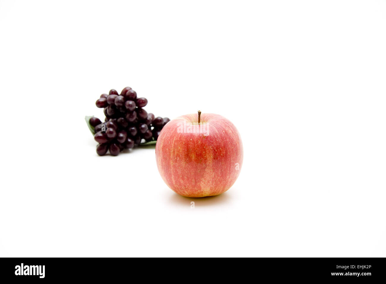 Apple and red grapes Stock Photo - Alamy