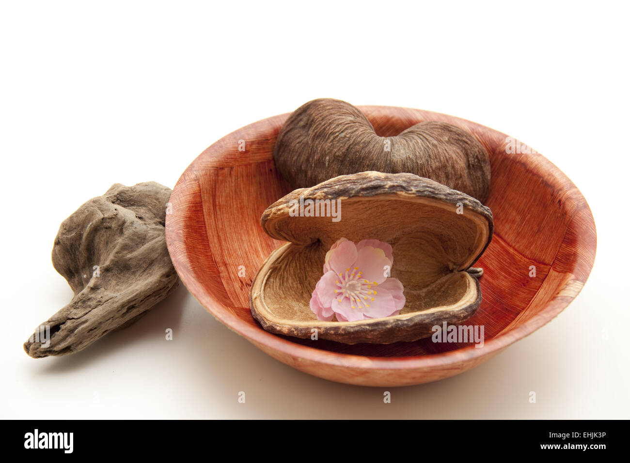 Nutshells in bowl Stock Photo - Alamy