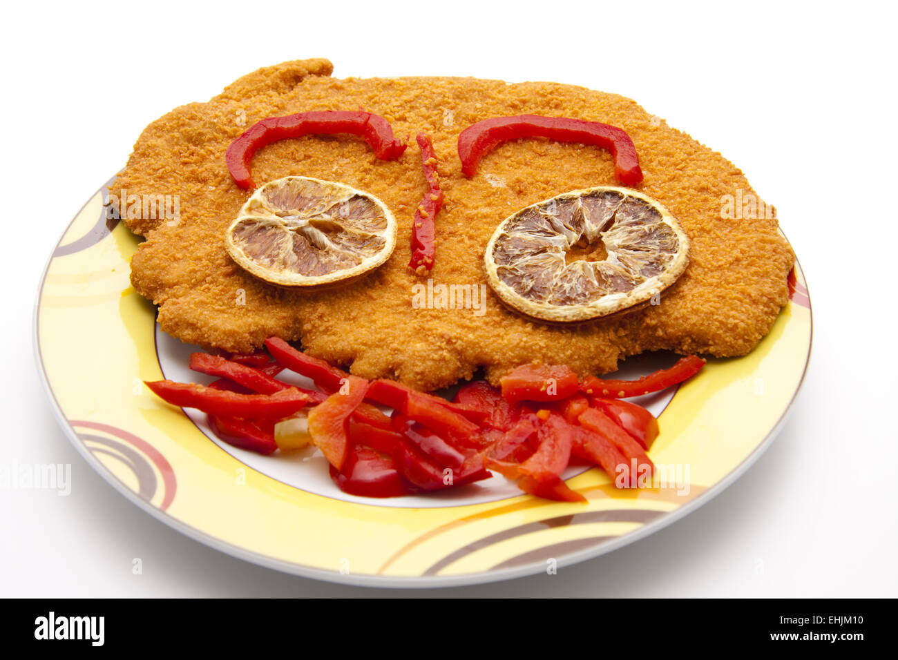 Pigs cutlet with ketchup Stock Photo - Alamy