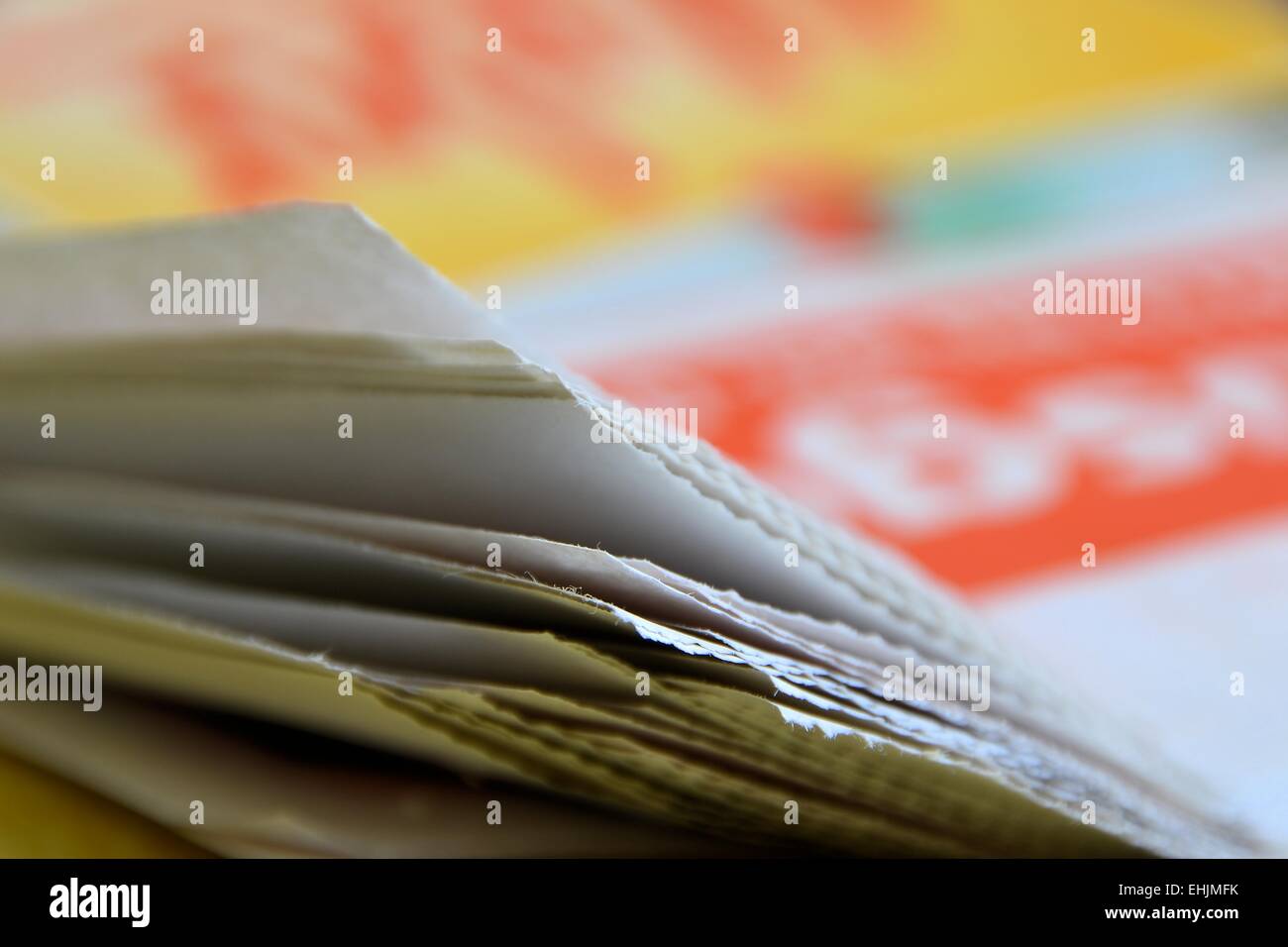 a newspaper lying on a table Stock Photo - Alamy