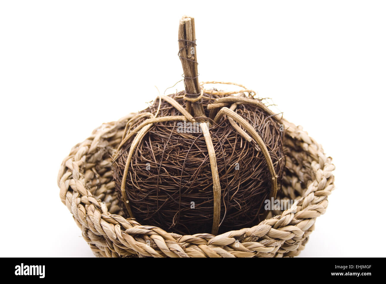 Straw sphere in the basket Stock Photo - Alamy
