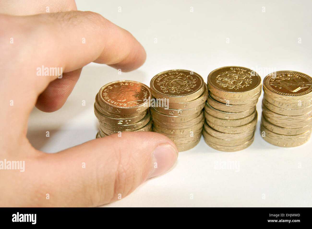 Counting coins hi-res stock photography and images - Alamy