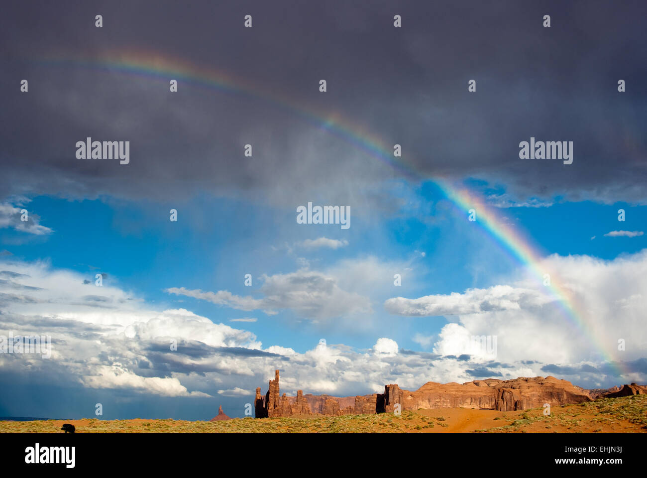 Rain and Rainbow at Monument Valley Stock Photo - Alamy