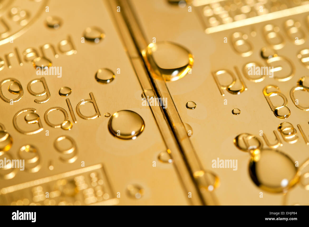 drops on a gold Stock Photo - Alamy