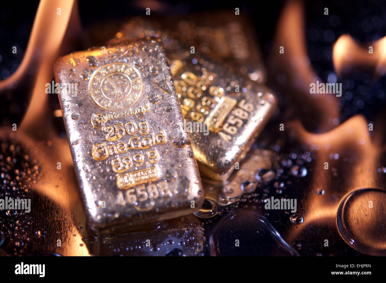 goldbars and flame Stock Photo - Alamy