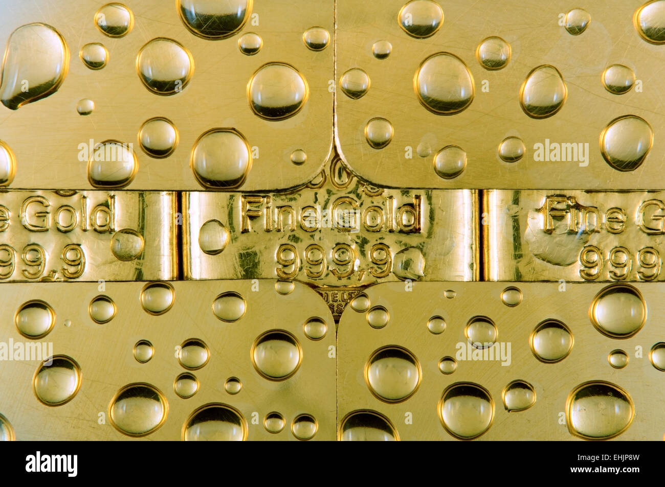 drops on a gold Stock Photo - Alamy