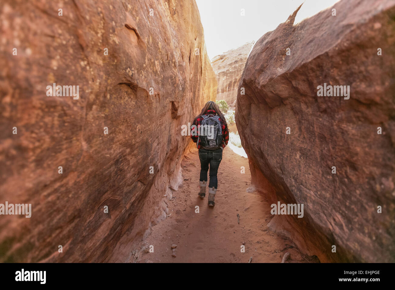 Female adventurer exploring the desert Stock Photo - Alamy
